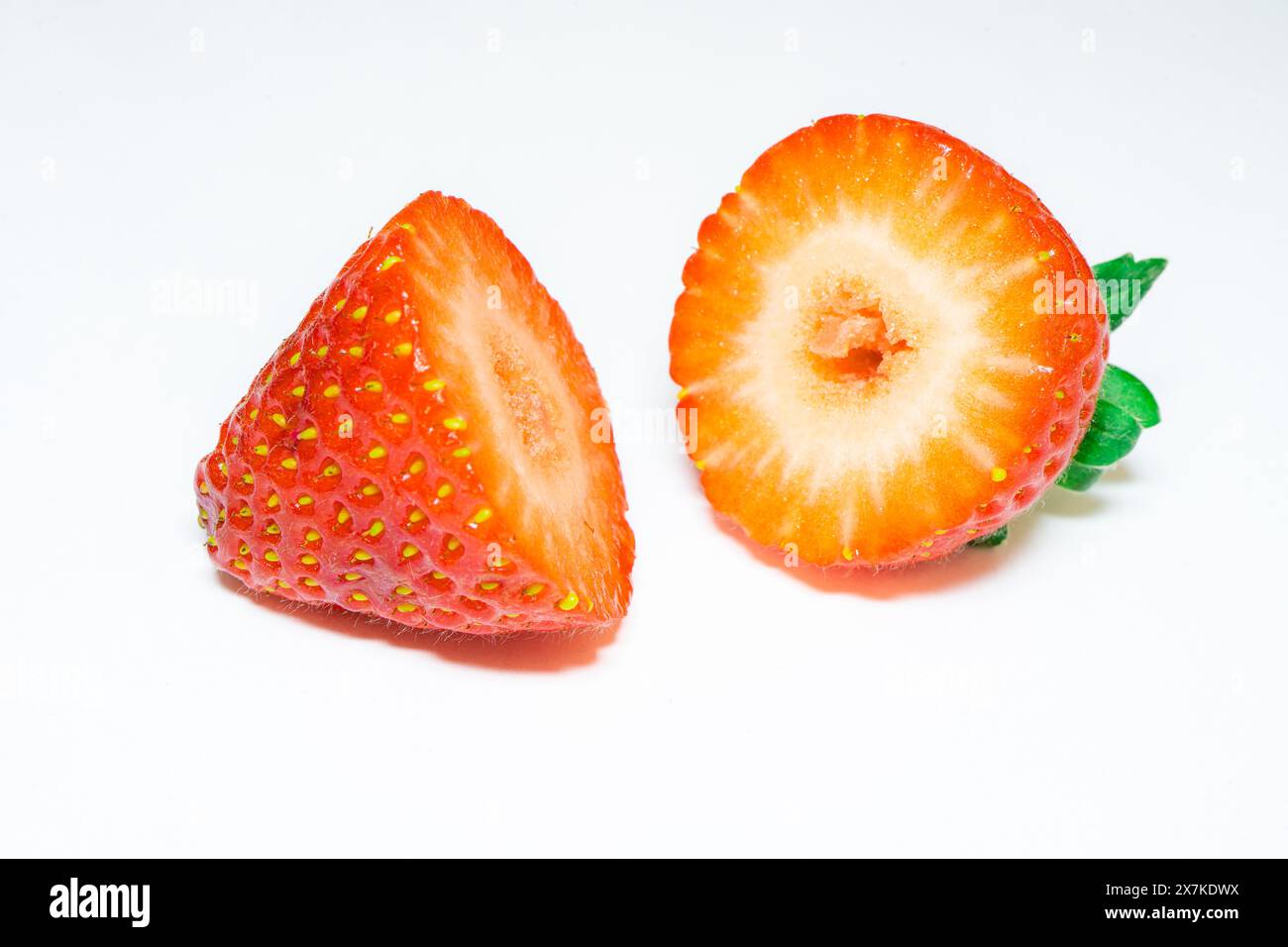 Close up of a juicy ripe strawberry slice hi-res stock photography and ...