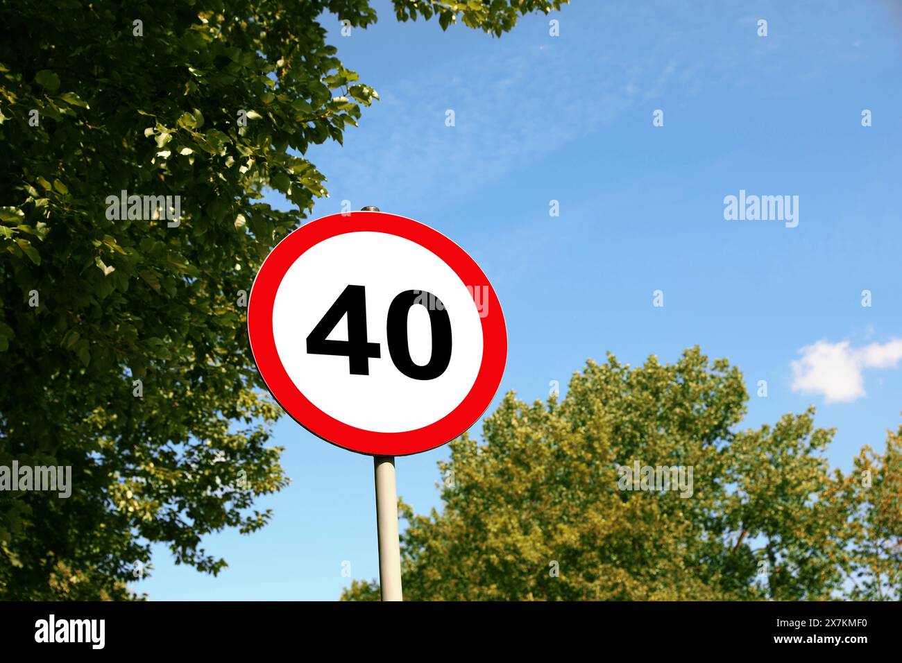 Road sign Maximum speed limit against blue sky Stock Photo - Alamy