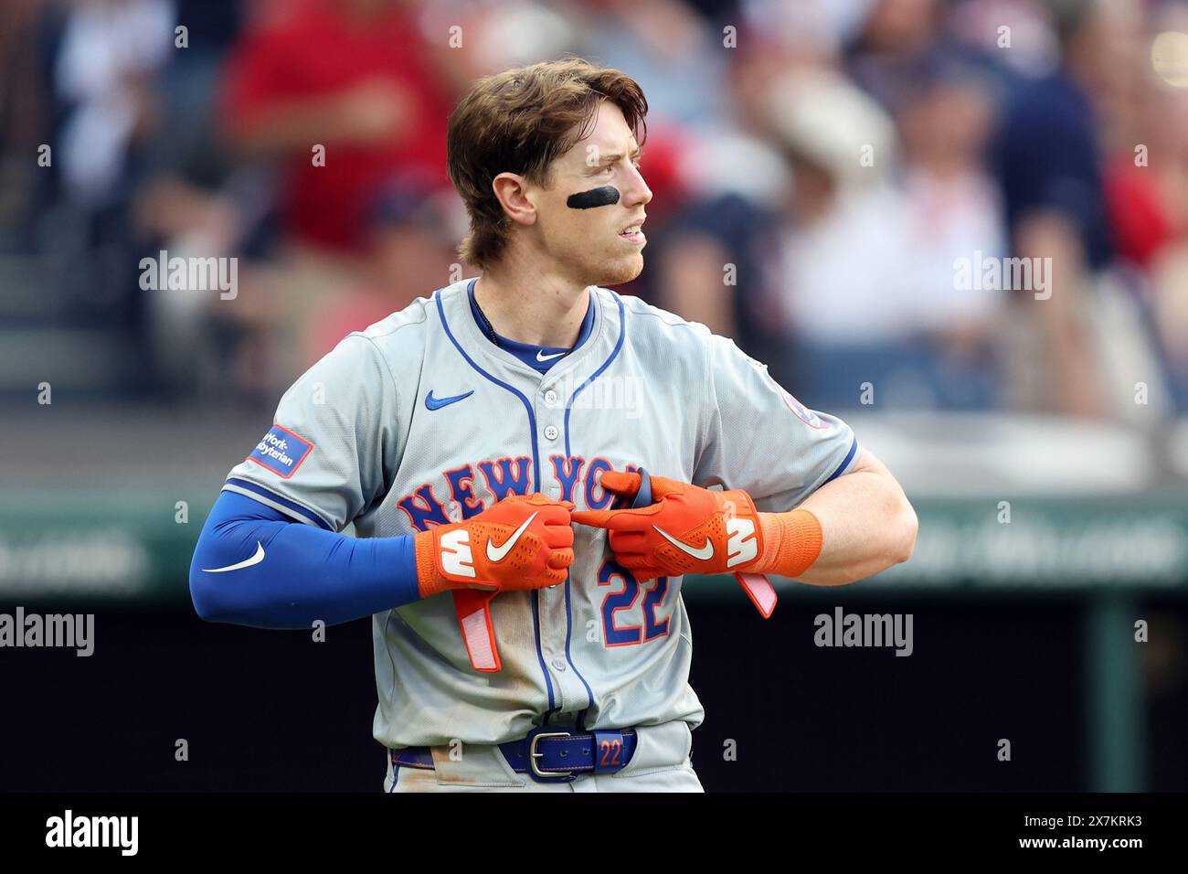 New York Mets Brett Baty (22) removes his gloves after striking out ...