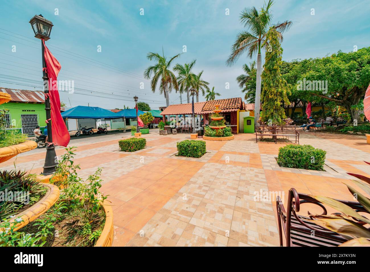 Nagarote central park surrounded by palms trees. Traditional park of ...