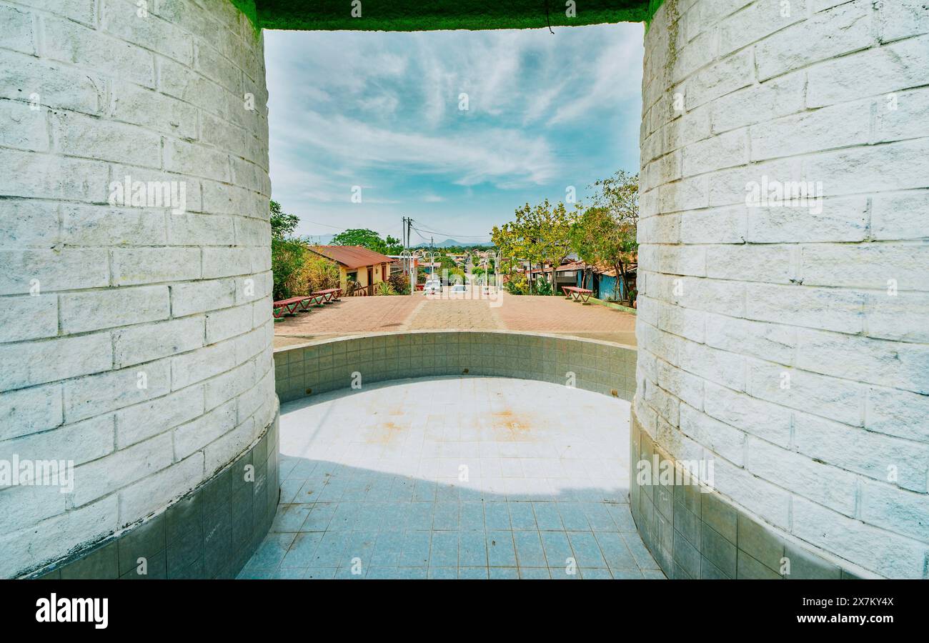 Street of Nagarote with a view of the Momotombo volcano, Nicaragua ...