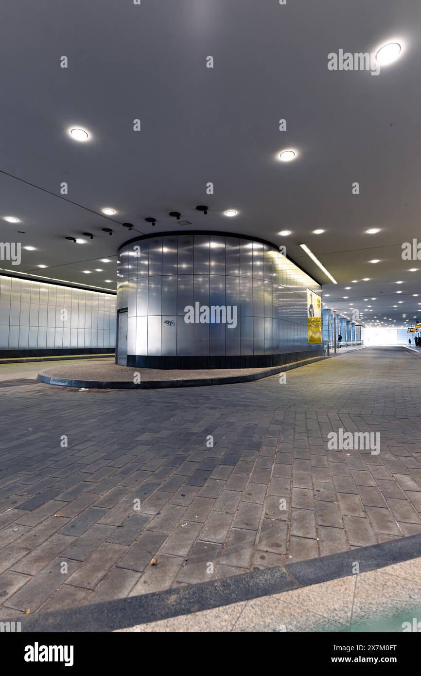 Modern bus station with illuminated ceilings and industrial design ...