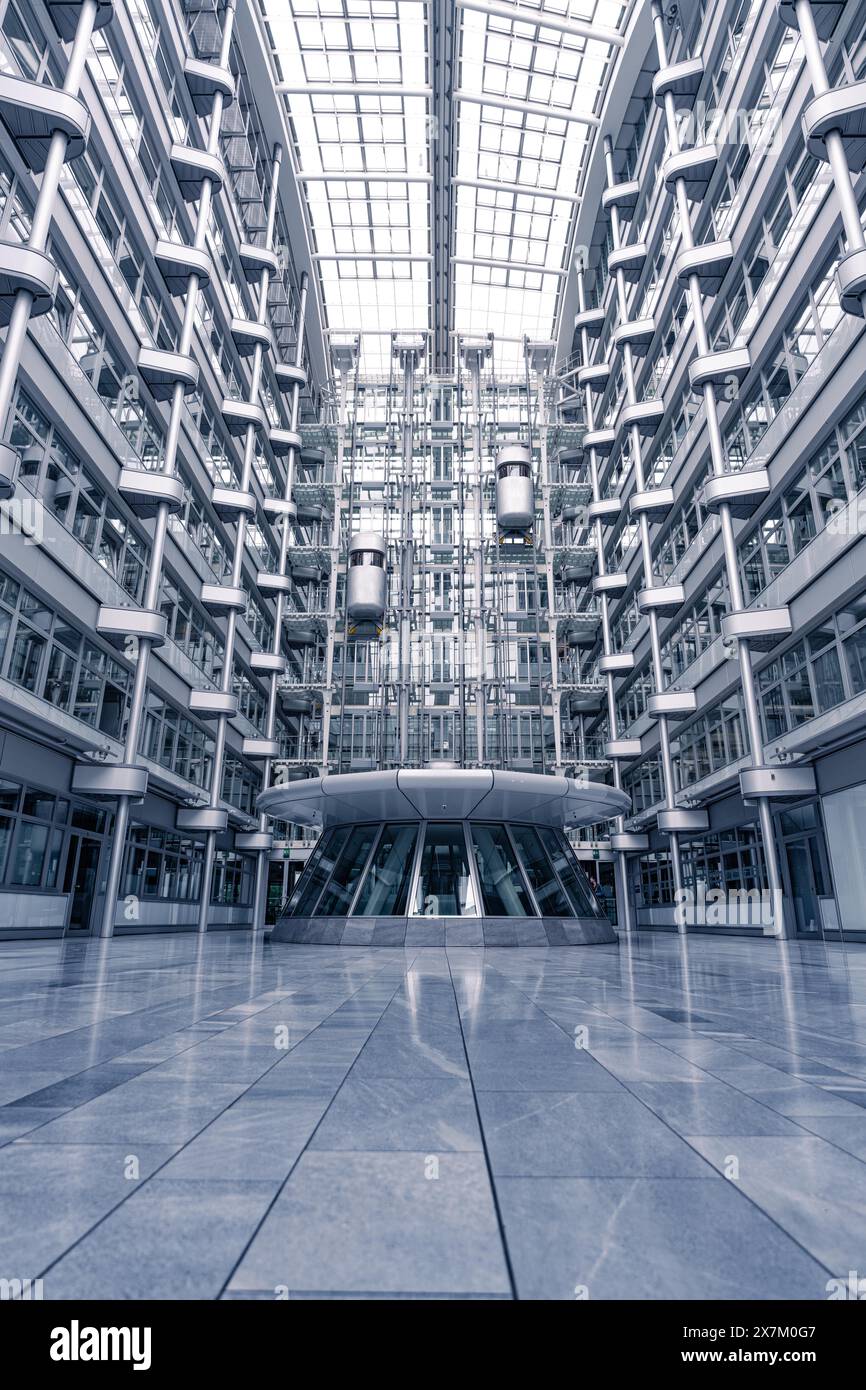 Interior of a modern building with glass facades and symmetrical ...