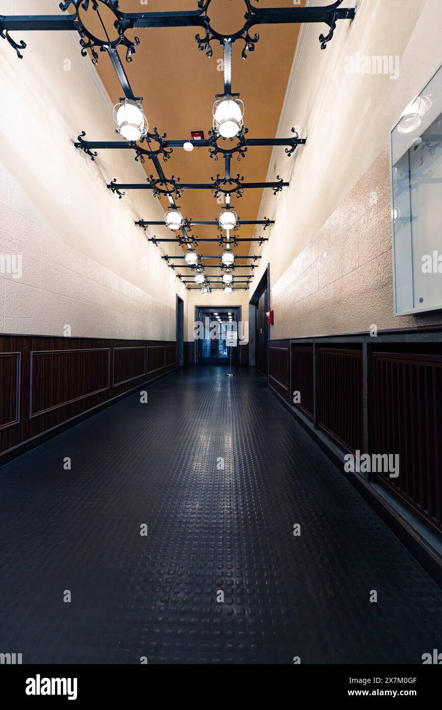 Historic hallway with dark floor and decorative lighting, Berlin ...