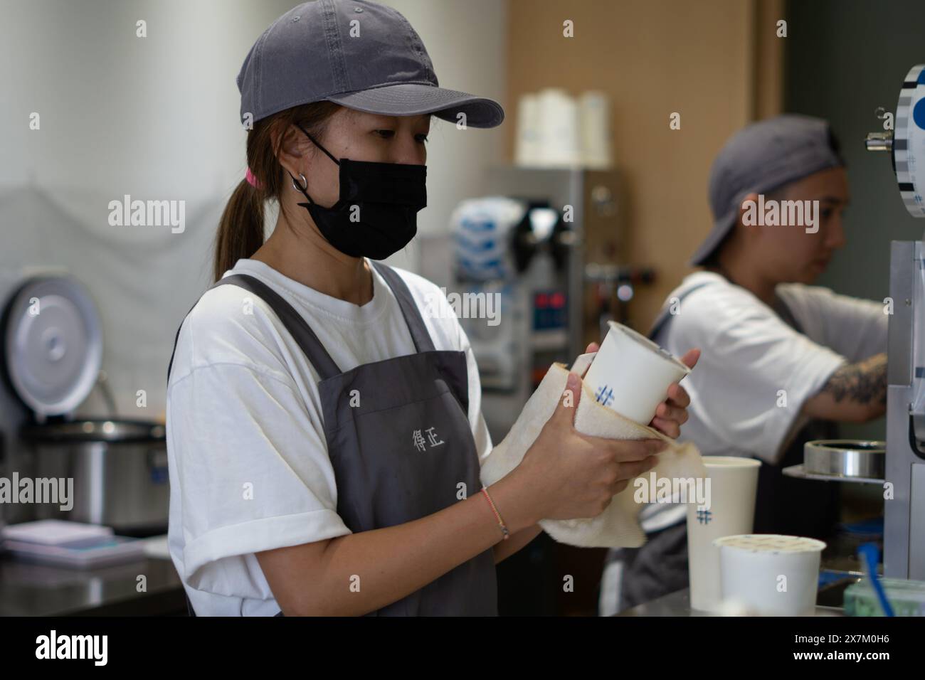 Skilled barista expertly making hi-res stock photography and images - Alamy