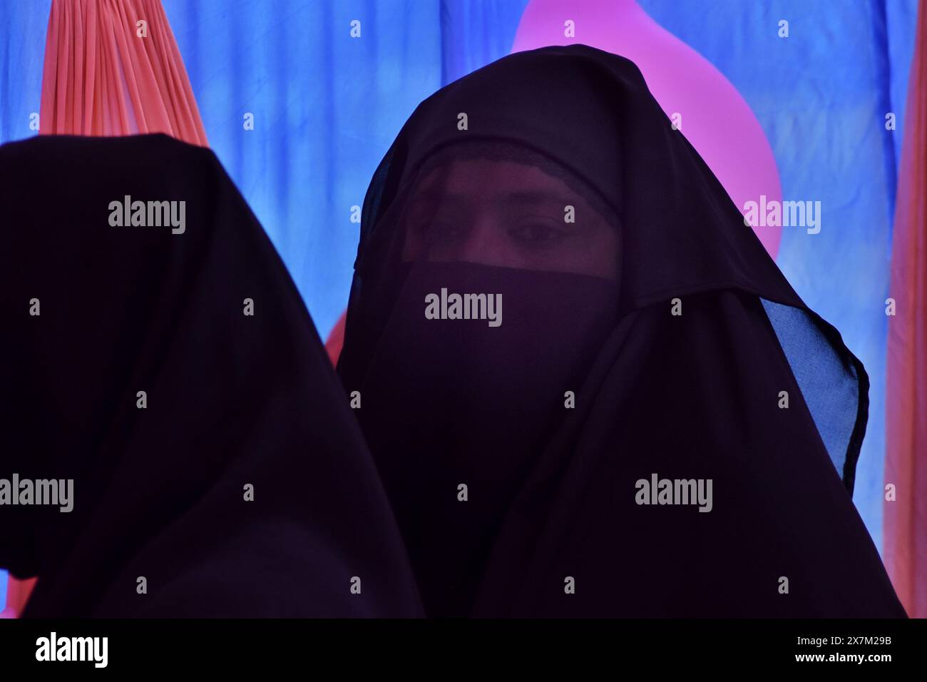 Baramulla, Jammu And Kashmir, India. 20th May, 2024. Burqa vailed woman ...