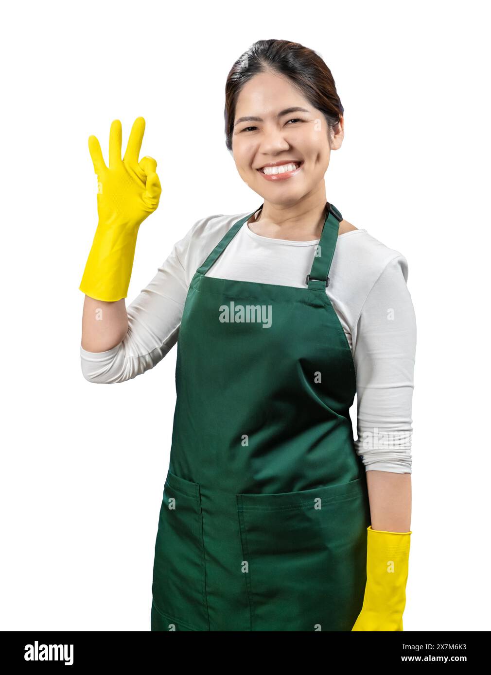 Asian housekeeper wear yellow rubber gloves and green apron okay ...
