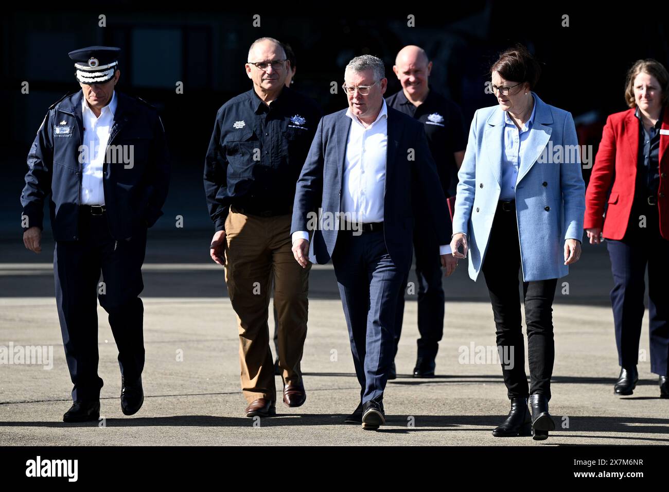 Federal Emergency Management Minister Murray Watt (centre) along with ...