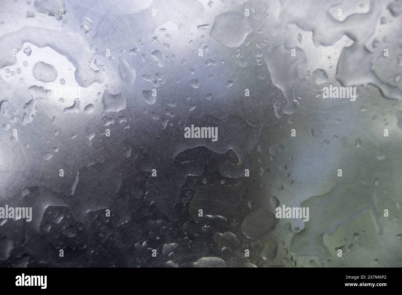Detail of wet steel surface with rain drops Stock Photo - Alamy
