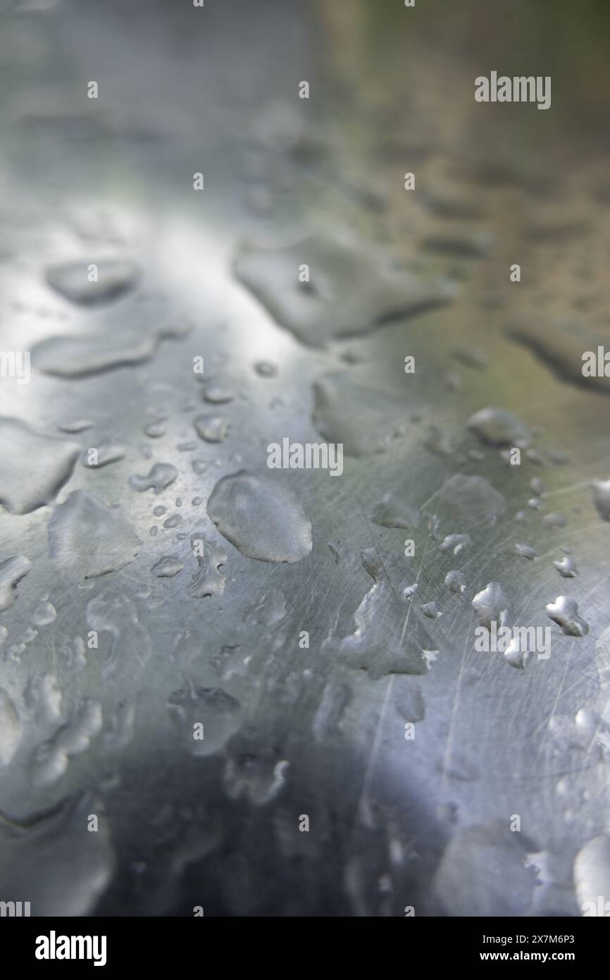 Detail of wet steel surface with rain drops Stock Photo - Alamy
