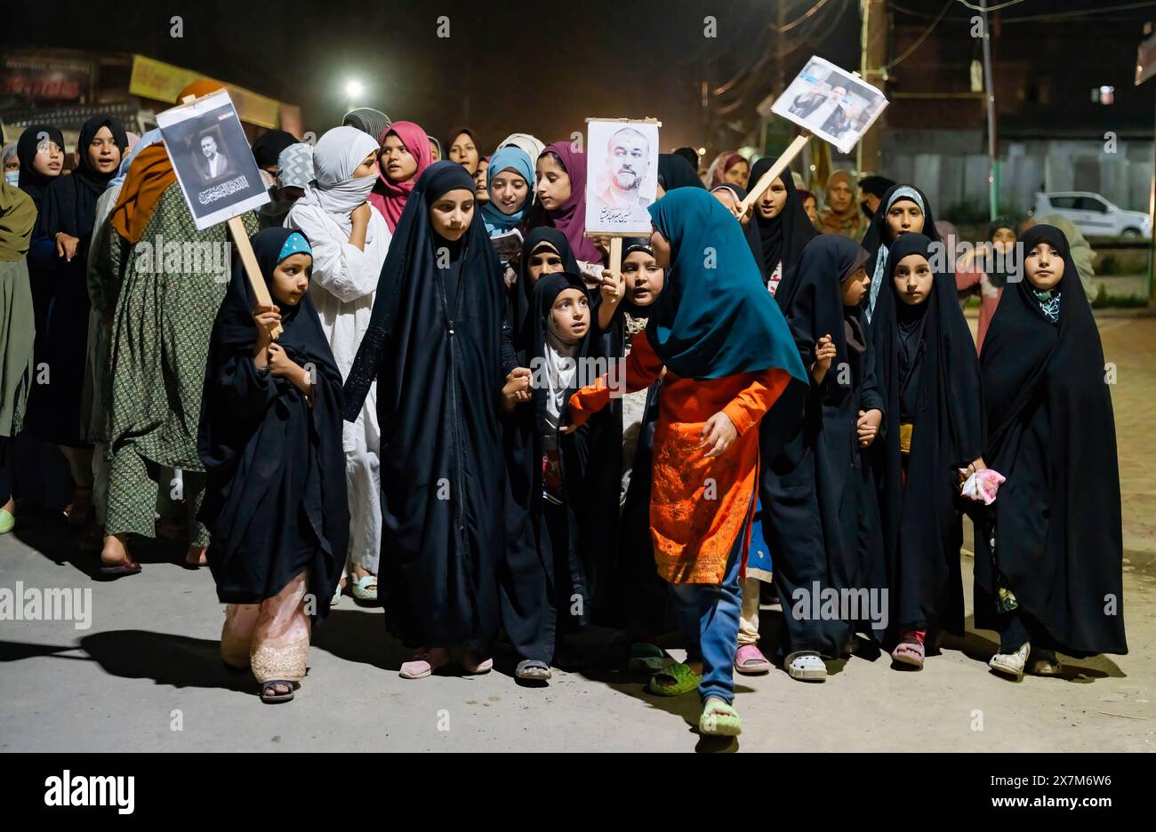 Srinagar, Kashmir. 20th May, 2024. Kashmiri Shia Muslim women march during a rally mourning the ...