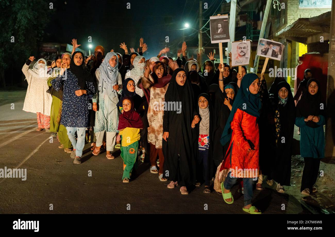 Srinagar, Kashmir. 20th May, 2024. Kashmiri Shia Muslim women march during a rally mourning the ...