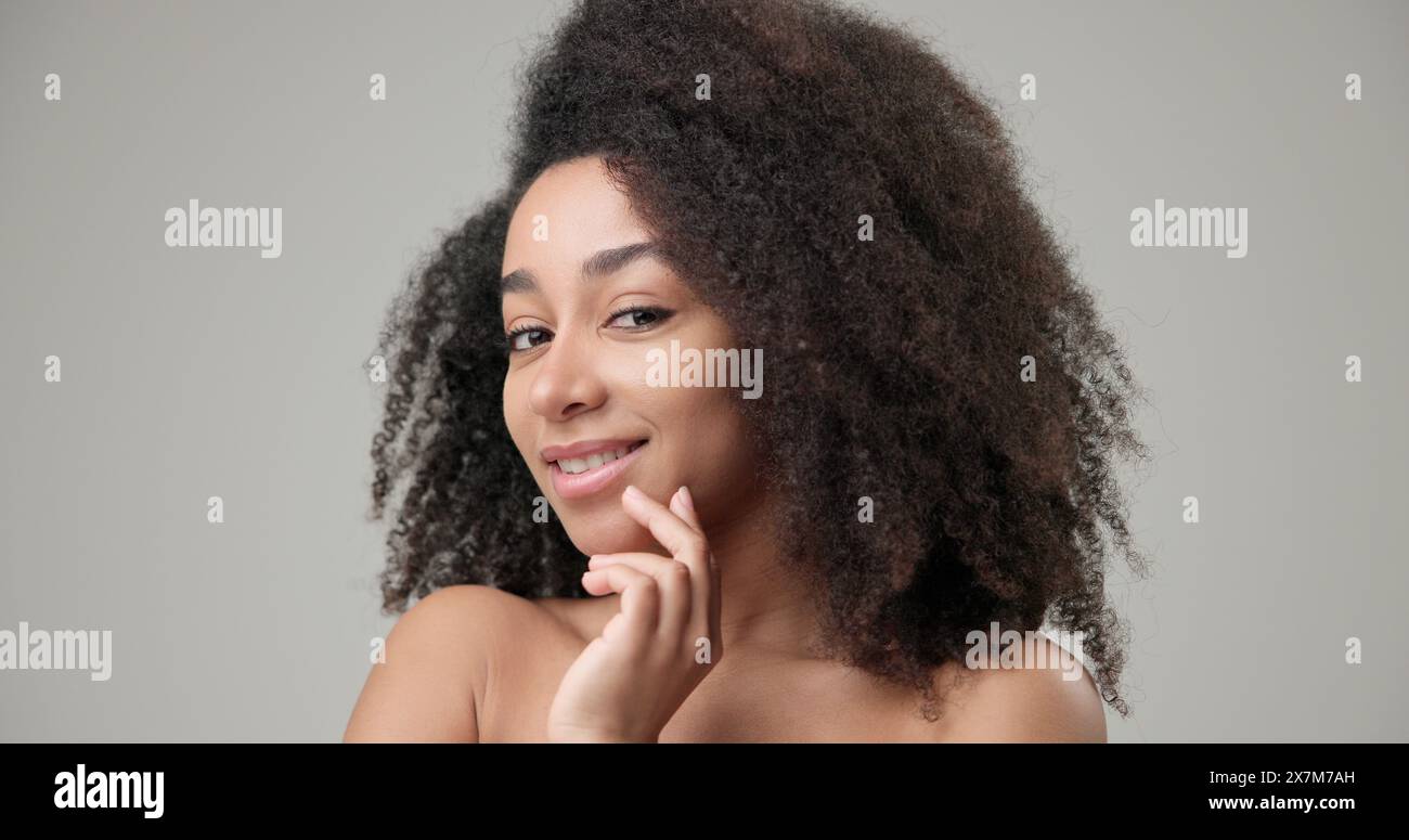 Beauty and healthcare concept - beautiful African American woman with ...