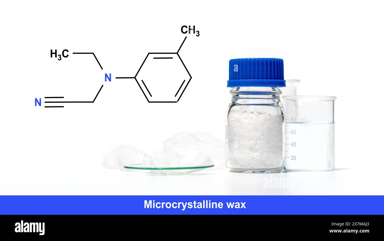 Microcrystalline wax with chemical formula on white laboratory table ...