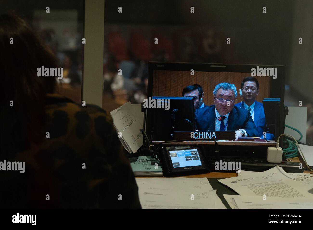 Ambassador Fu Cong of China seen on screen at translator booth as he ...