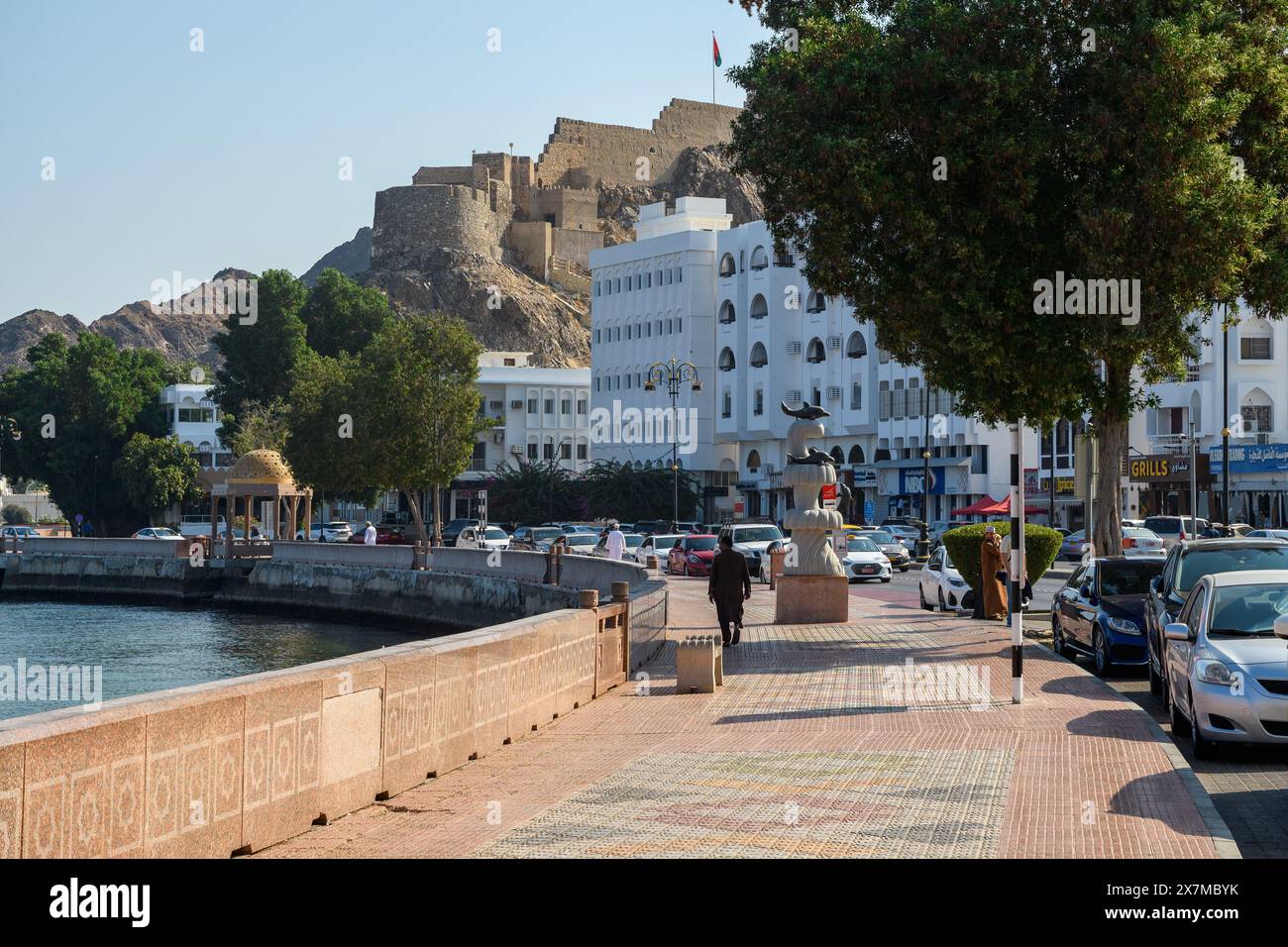 Muscat, Oman - January 2, 2024: The historic fort oversees a modern ...