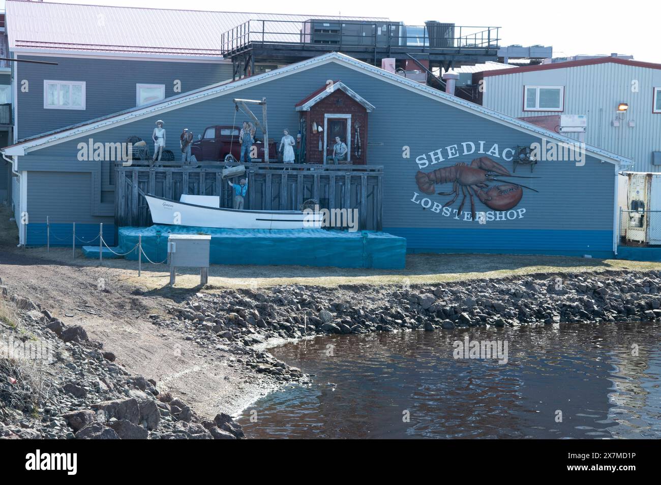 Mural of people, boat and vintage red truck at the Shediac Lobster Shop ...