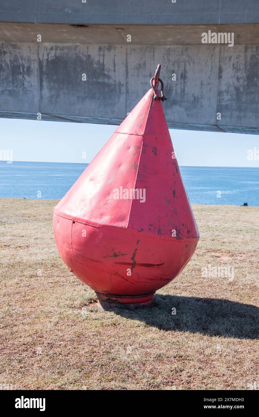 Red marker buoy display beside the Confederation Bridge in Borden ...