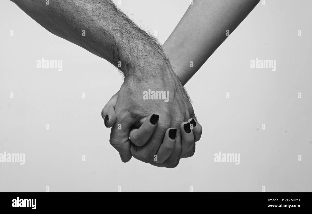 Helping hands. Holding hand, close up. Giving a helping hand. Support ... Helping hands. Holding hand, close up. Giving a helping hand. Support ...