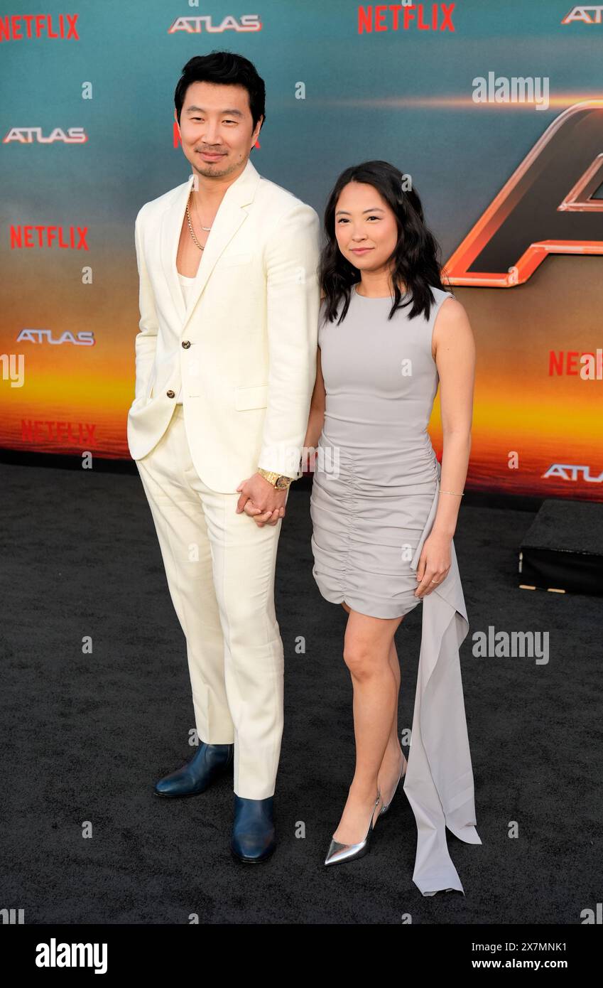 Simu Liu and Allison Hsu pose together at the premiere of the film ...
