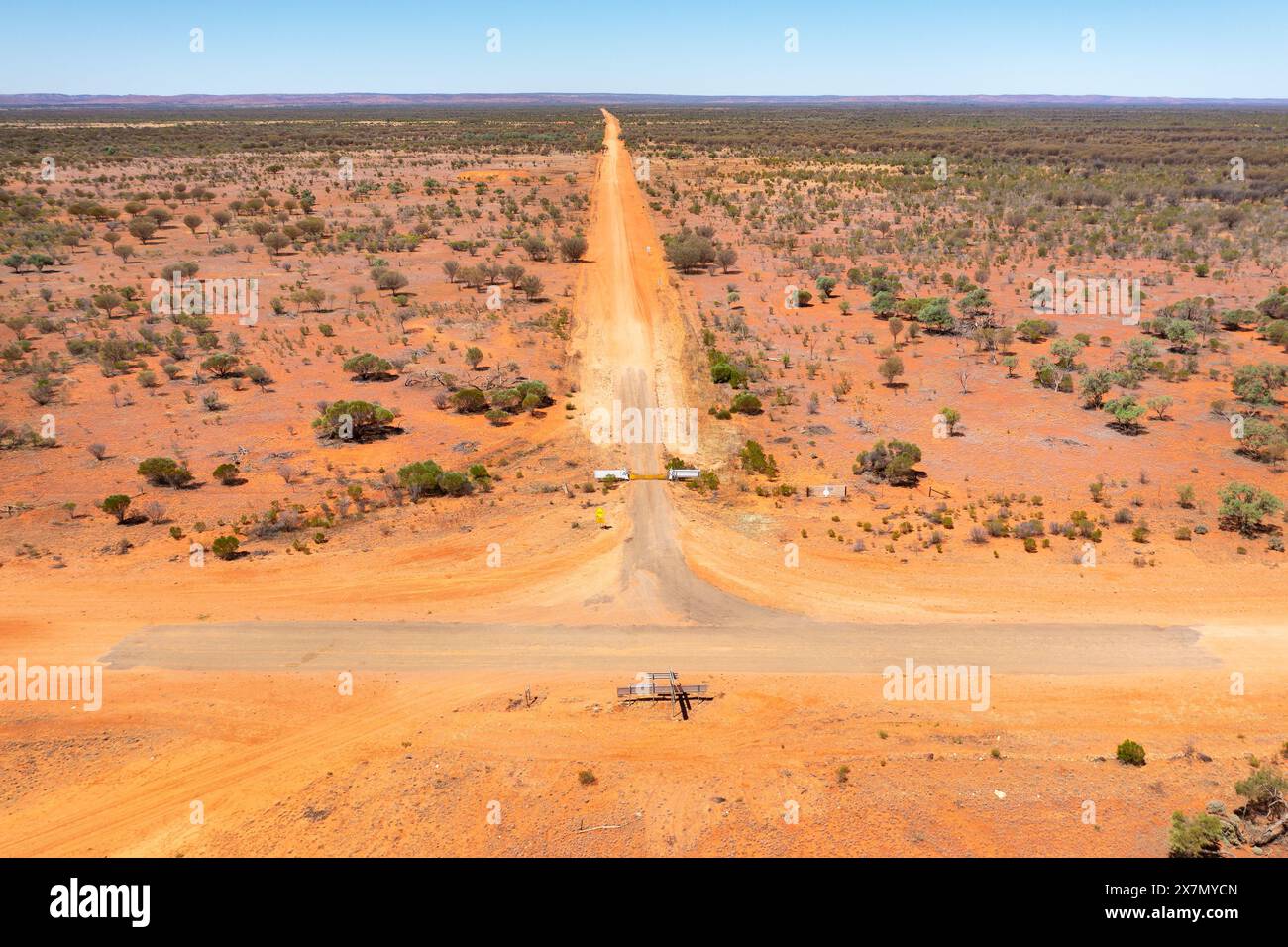 Aerial view of a remote T intersection and gateway in a arid outback ...