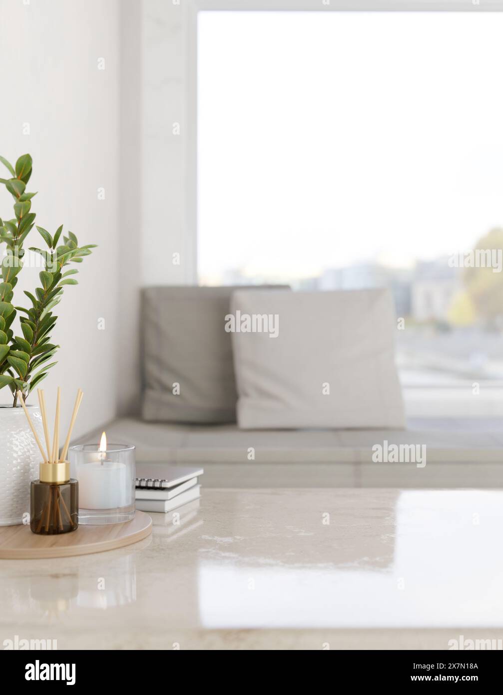 A close-up image of a luxury coffee table featuring a candle, books, a ...
