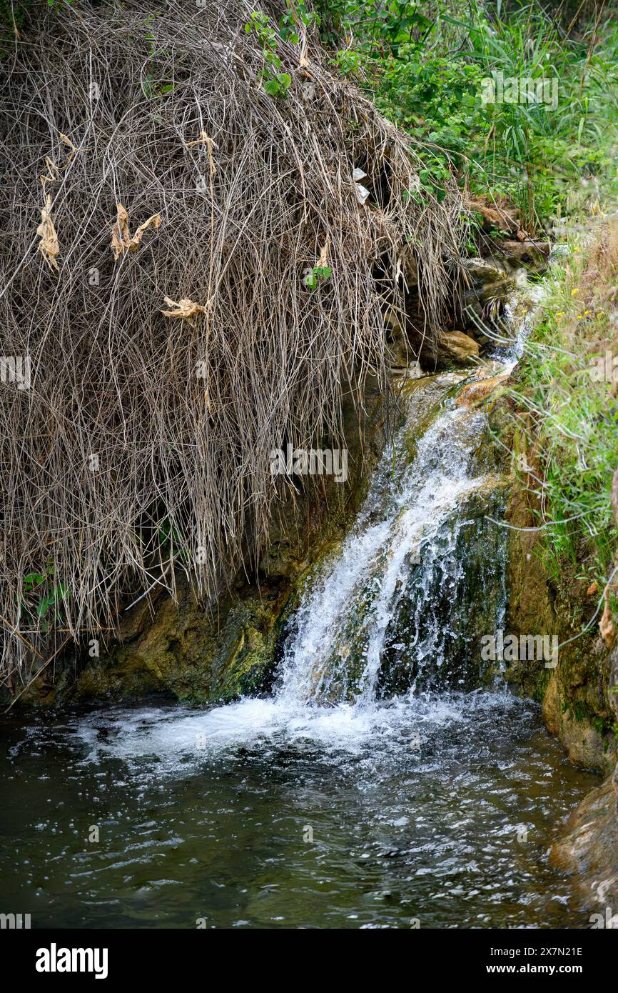 flowing water and waterfall in a small stream Photographed at Tzalmon ...