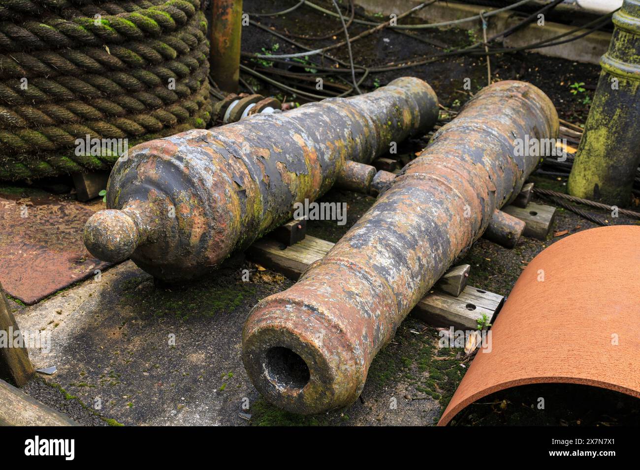 Old rusty cannons in the dockyard of Bristol city, England Stock Photo ...