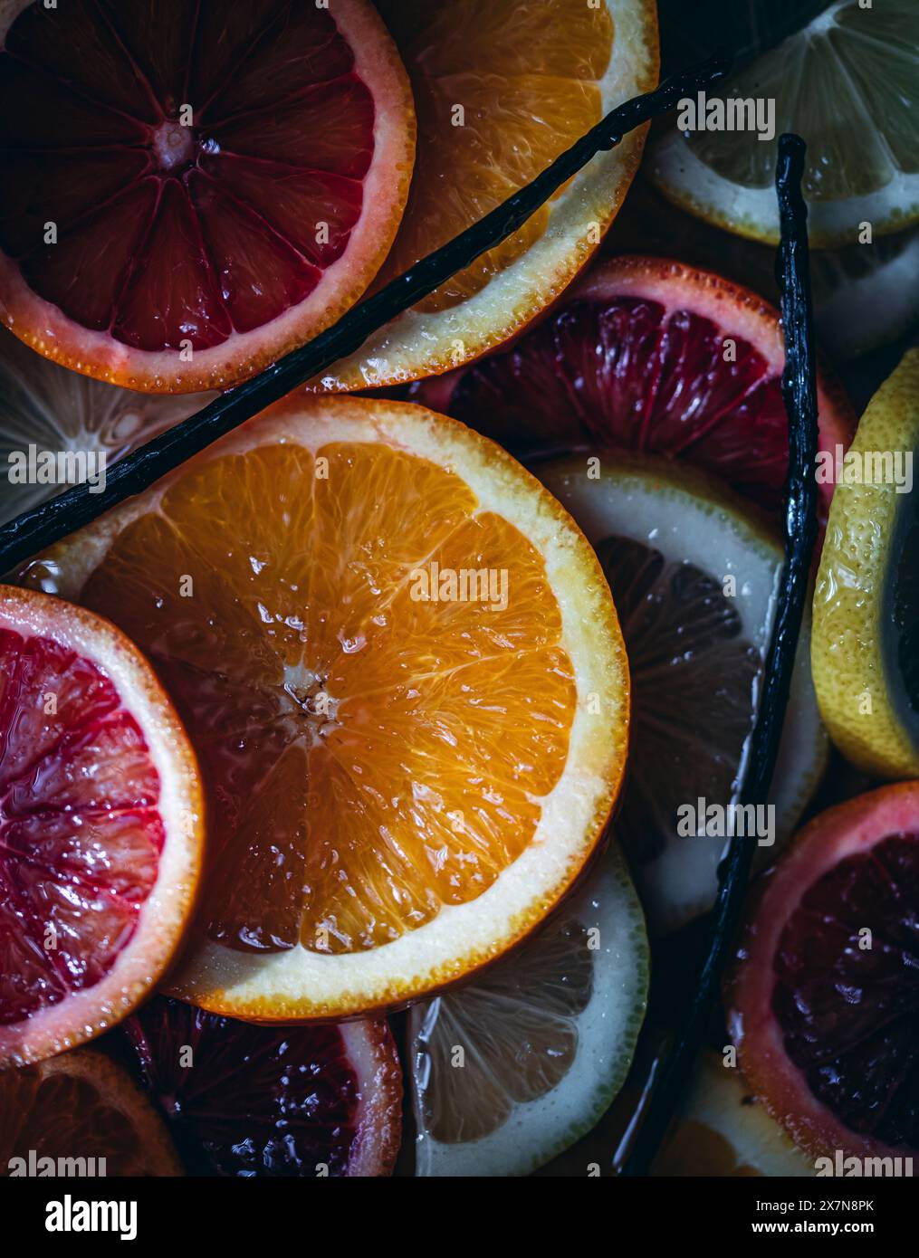 Orange slices in maple syrup with vanilla Stock Photo - Alamy