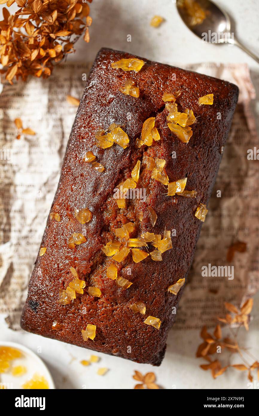 An uncut stem ginger loaf cake Stock Photo - Alamy