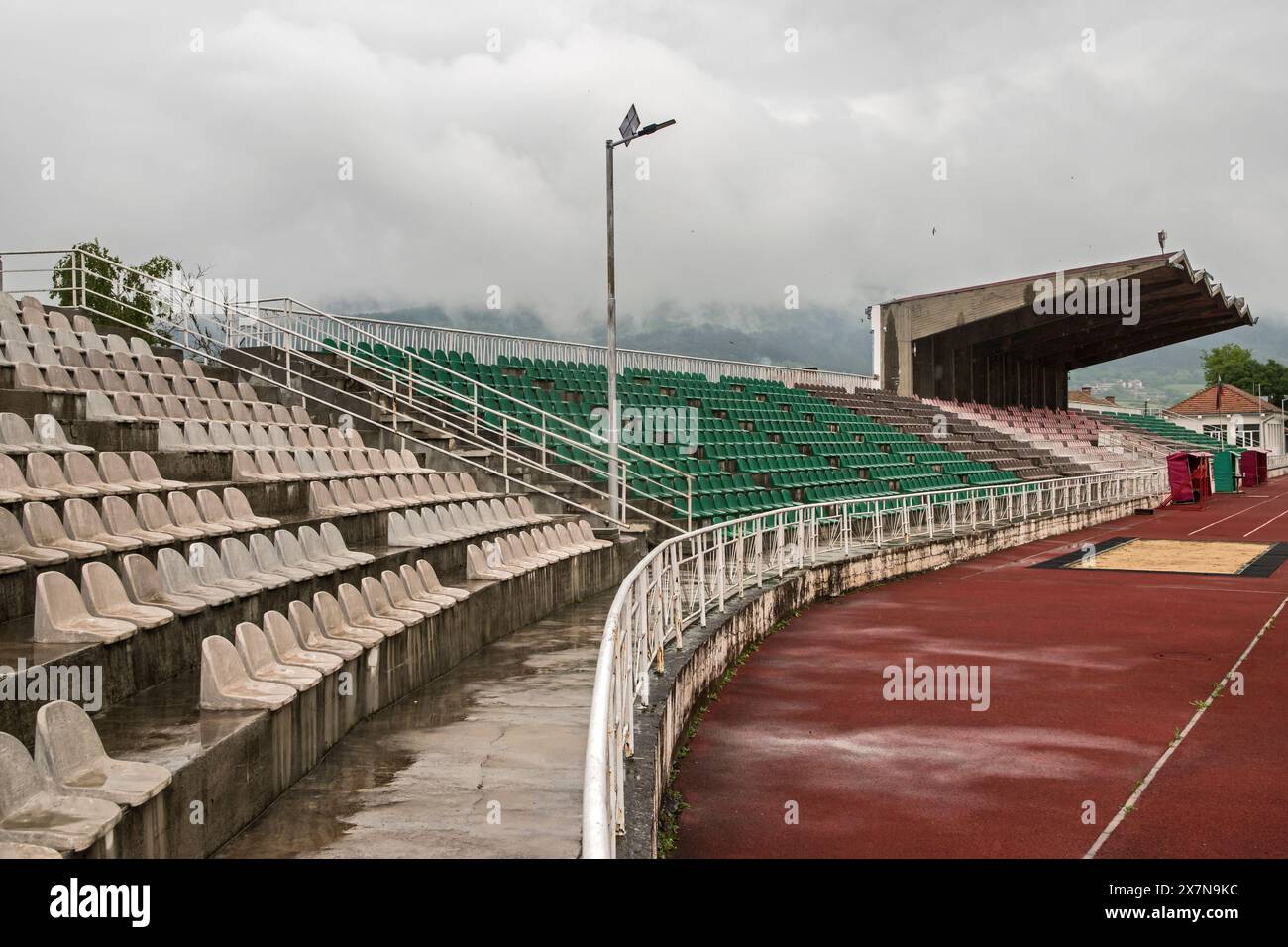 Stadium bleachers in stadium on cloudy day Stock Photo - Alamy