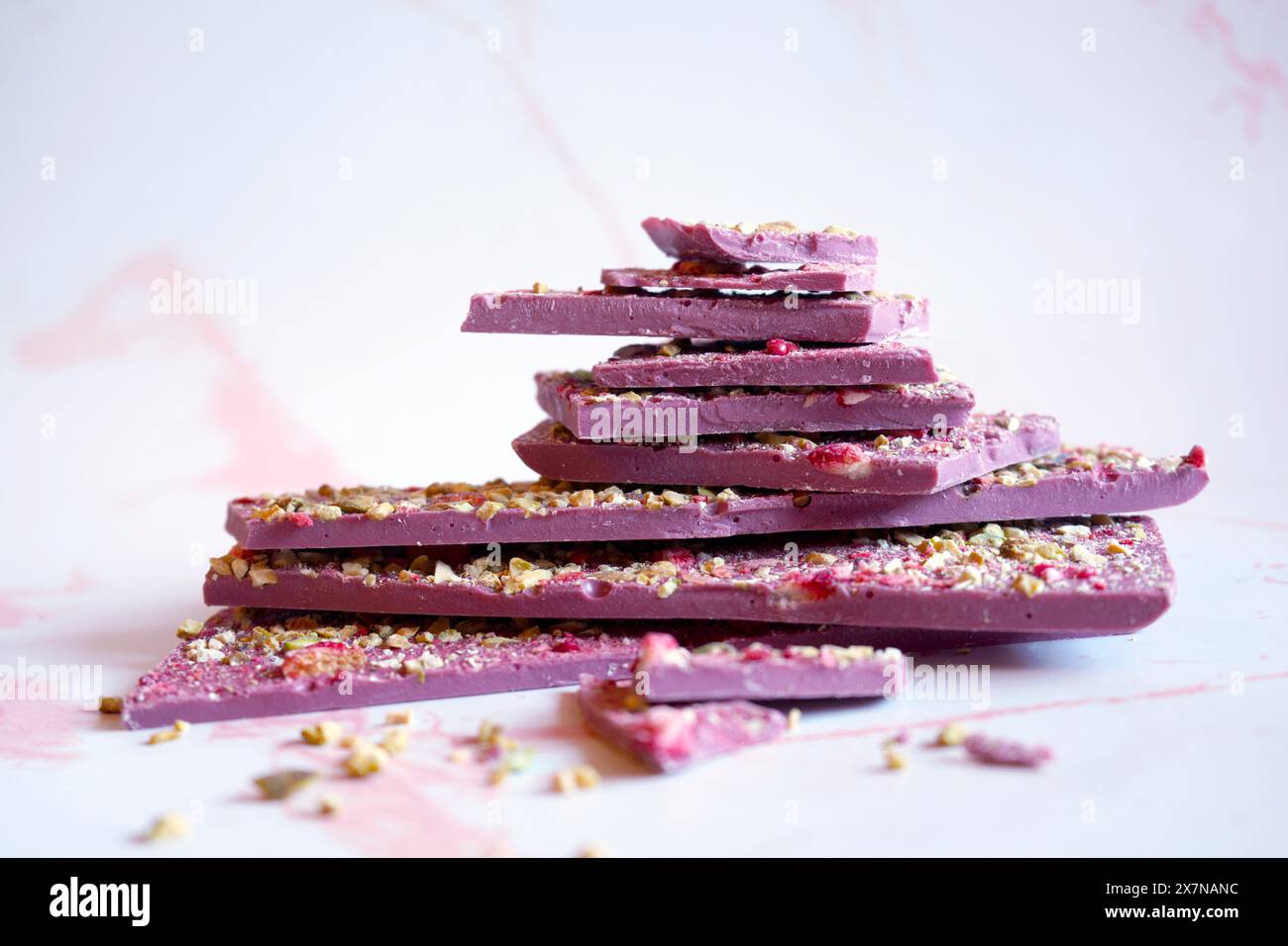 Ruby chocolate made from selected botanical cocoa bean varieties. Dried ...