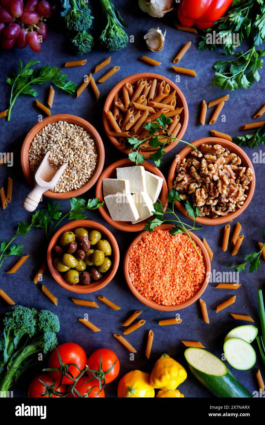 Plant-based whole food diet raw ingredients including fruit, vegetables ...