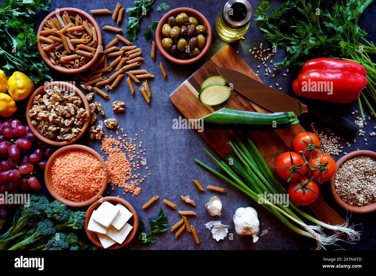 Plant-based whole food diet raw ingredients including fruit, vegetables ...