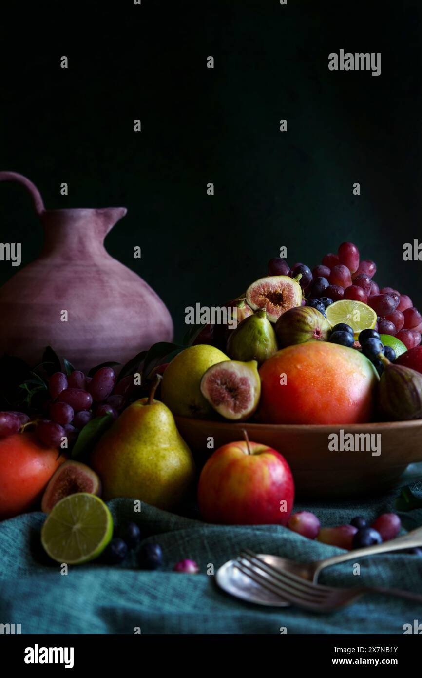 Seasonal Autumn Fruit Bowl with Apples, Pears, Mangoes, Figs, Limes ...
