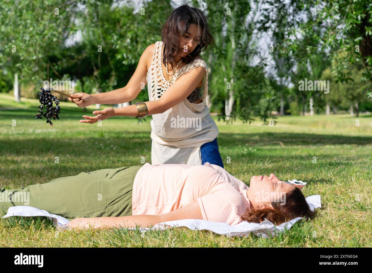 Outdoor breathwork therapy. Latin woman therapist Stock Photo - Alamy