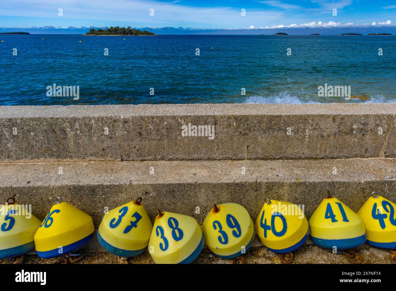Winning the lottery colorful buoys with numbers and letters on the ...