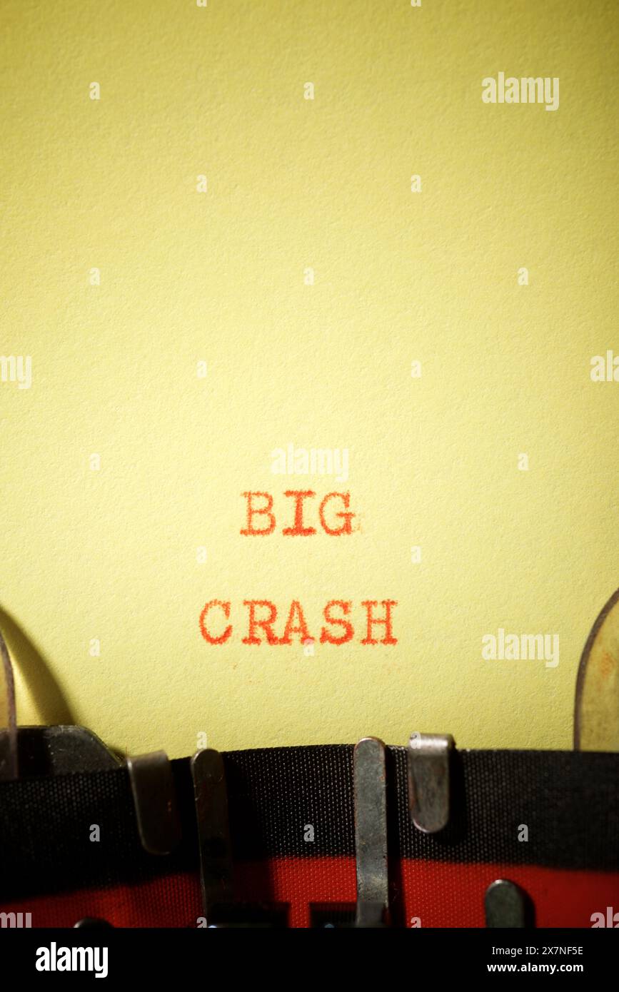 Big crash text written with a typewriter Stock Photo - Alamy