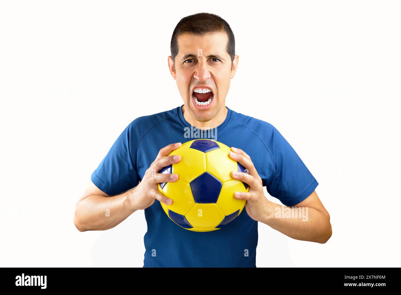 Man holding soccer football ball over isolated white background ...