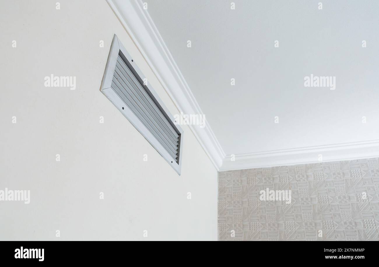 Ventilation grill in the room. Built-in air conditioner Stock Photo - Alamy