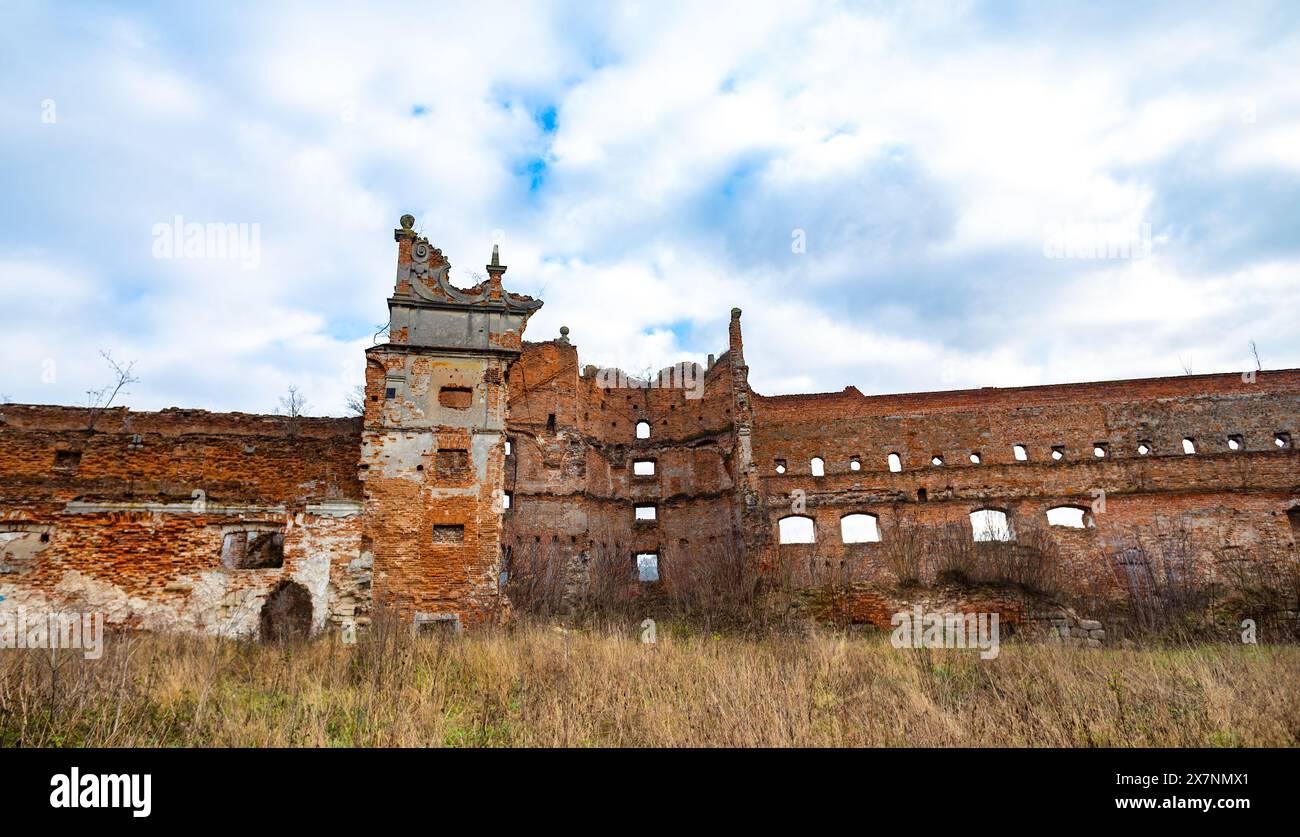 The old ruins of the collapsed walls with gates and windows ...
