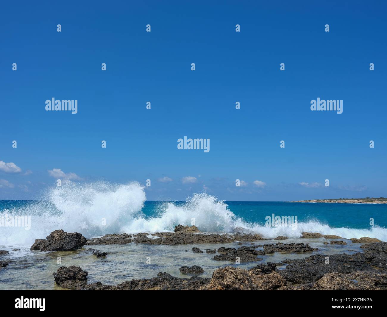 May 2024, Breaking waves over the rocks at Pegeia, Pafos, Cyprus Stock ...