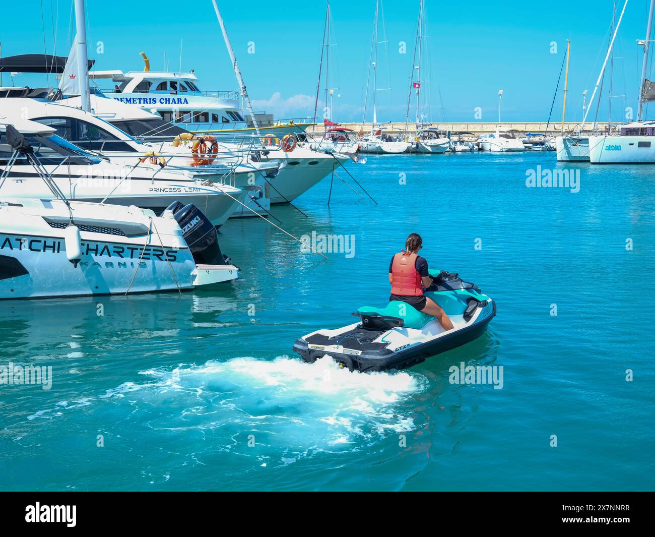 May 2024, Jet ski as a tender launch in Latsi harbour, Cyprus Stock ...