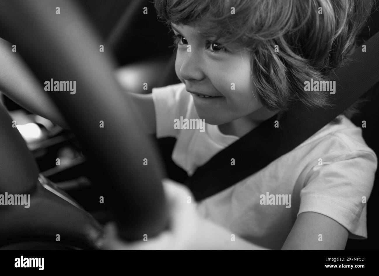 Little Driver. Cute little boy pretending to drive. Little kid driving ...