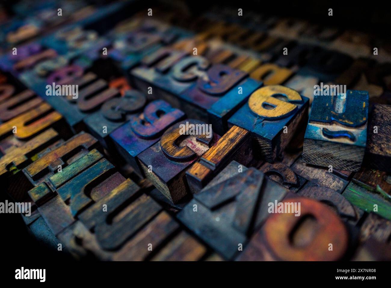 The movable wooden letterpress types are seen stored in a tray at an ...
