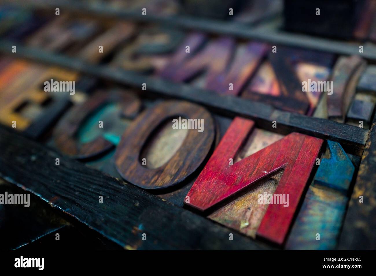 The movable wooden letterpress types are seen stored in a tray at an ...