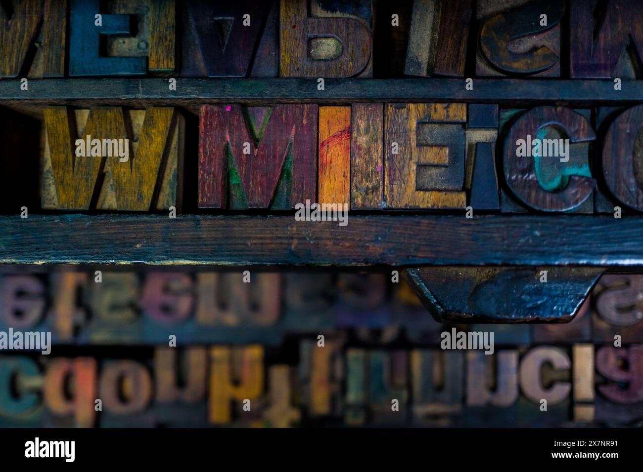 The movable wooden letterpress types are seen stored in a tray at an ...