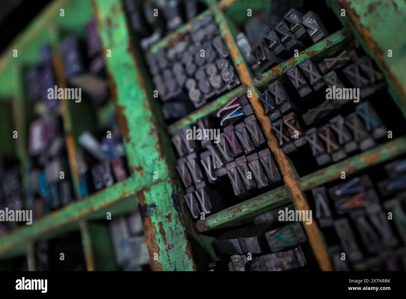The movable metal letterpress types are seen stored in a type case at ...