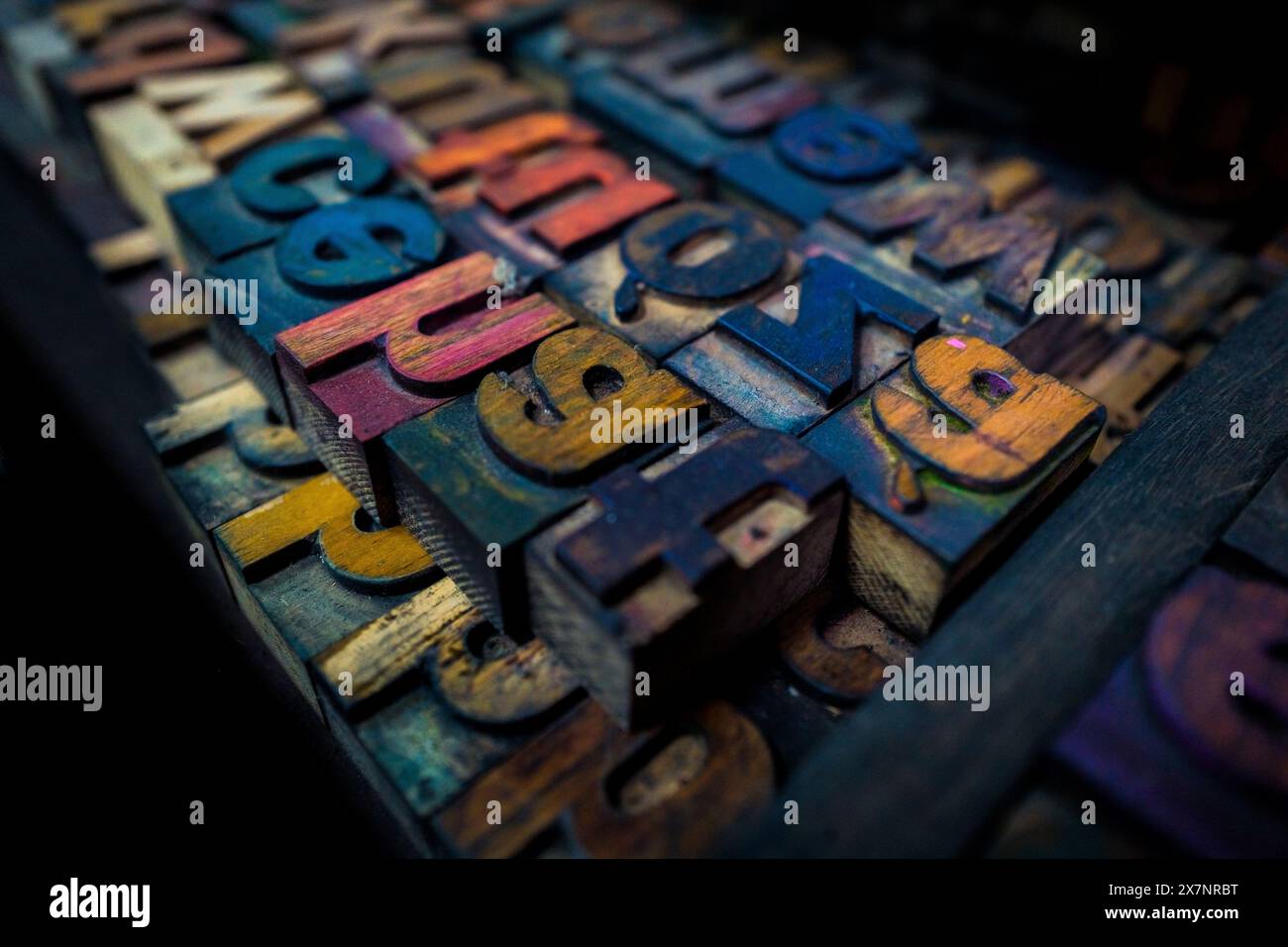 The movable wooden letterpress types are seen stored in a tray at an ...
