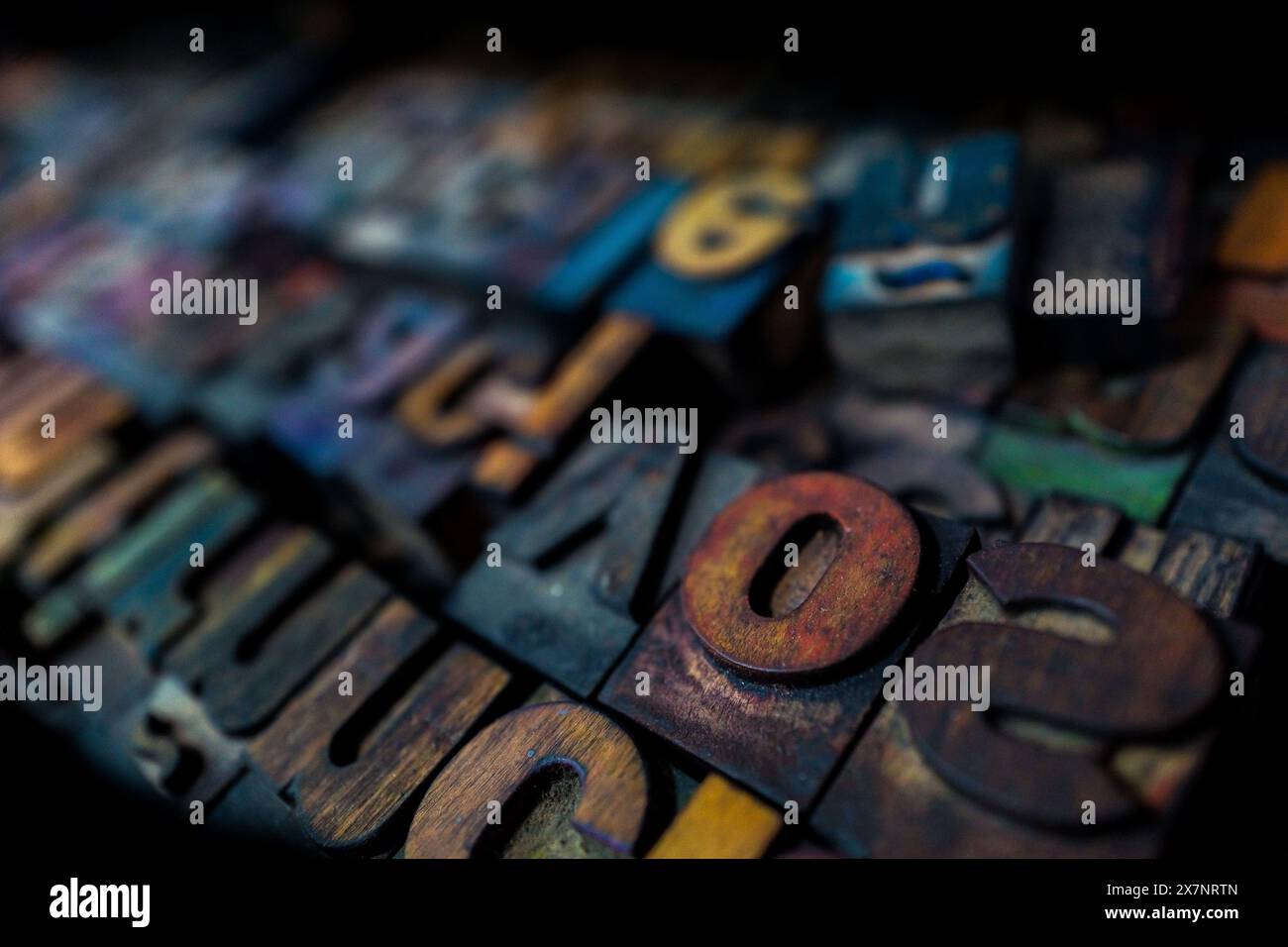 The movable wooden letterpress types are seen stored in a tray at an ...